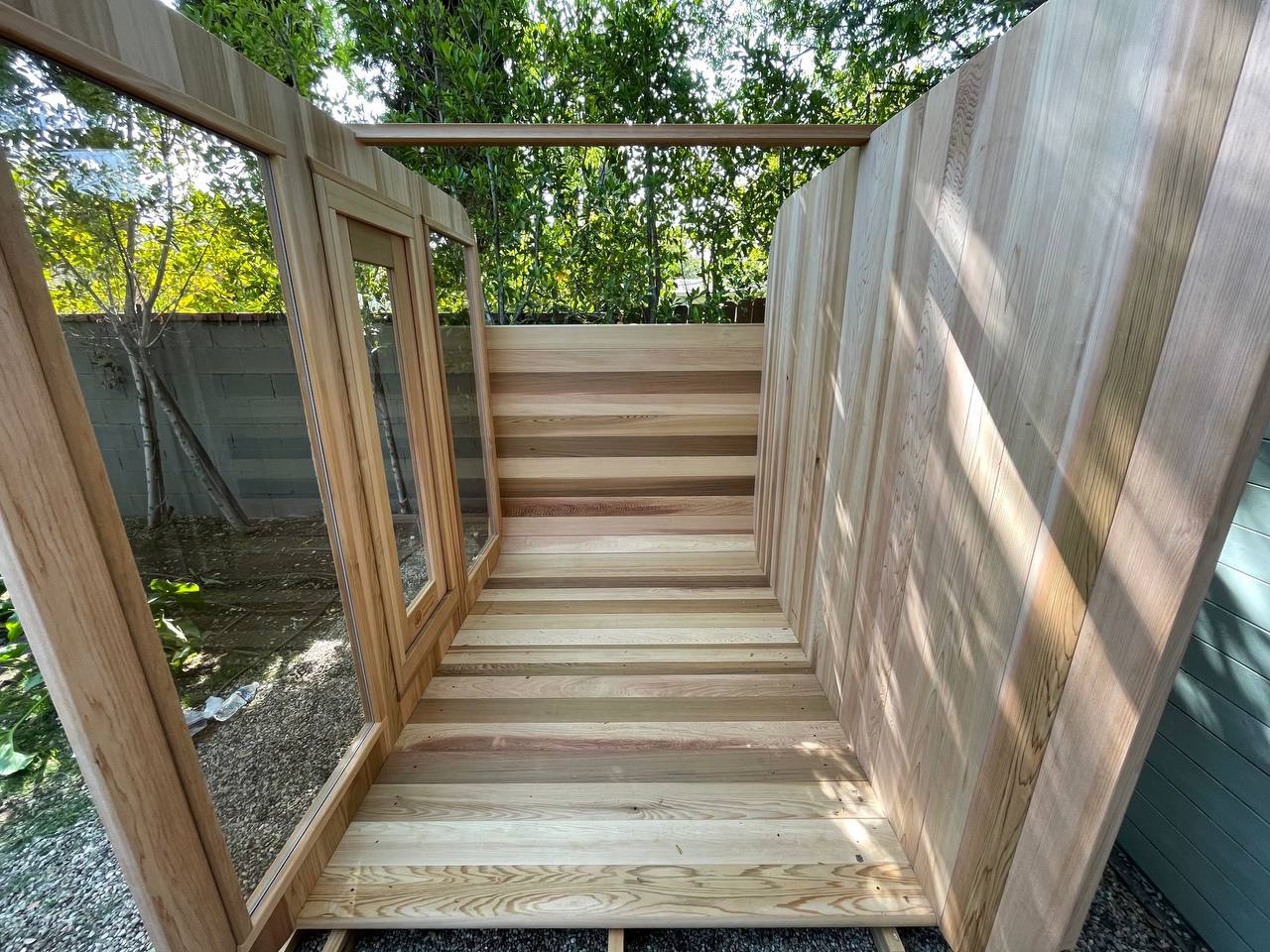 Elegant Two-Level Wooden Sauna Installation - VYV Services