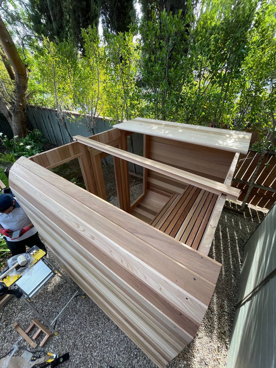 Elegant Two-Level Wooden Sauna Installation - VYV Services